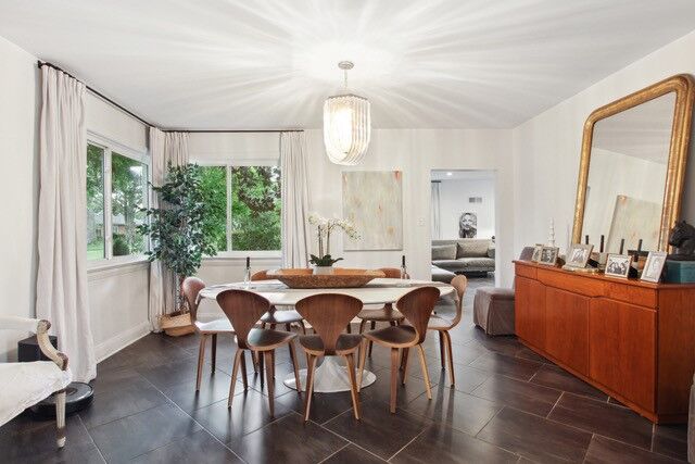 $1.7M Art Deco home in Lake Vista is luxe outside, too, with pool and ...