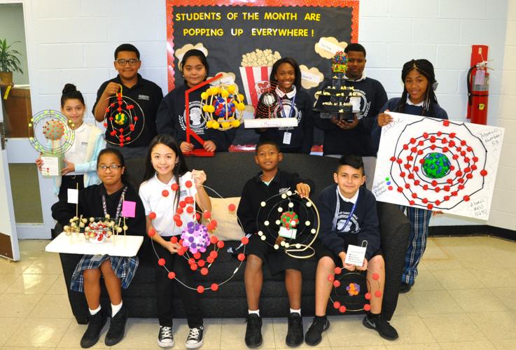 Einstein Charter Middle School sixth-graders study structure of atoms ...