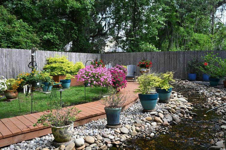 Tucked away on a bayou yet close to Old Mandeville, this home is an ...