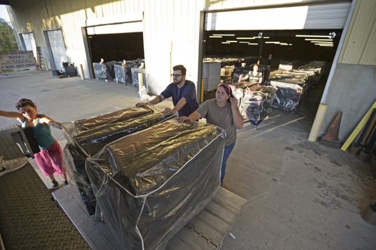 Photos: Election Day Eve, Polling Machines Leave Warehouse for Orleans ...