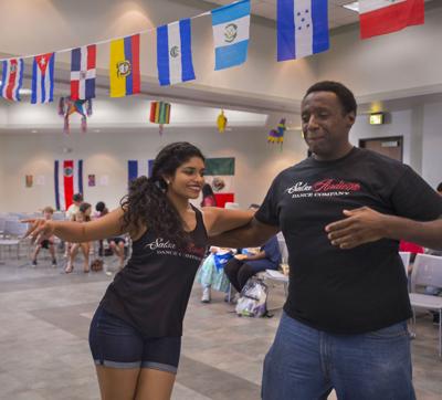 Salsa dancing gets feet moving at Hubbell Library during Hispanic ...