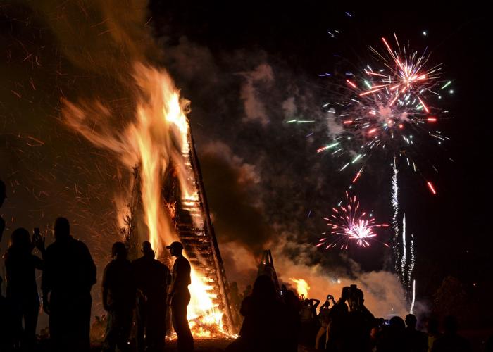 Photos: Bonfires go up along Mississippi River levee on Christmas Eve ...