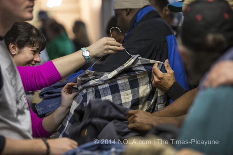 Volunteers warm up New Year's Eve for the homeless with clothing ...