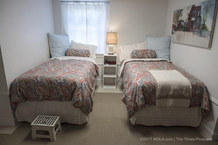 Smart renovation transforms dingy raised basement into a bright hobby ...