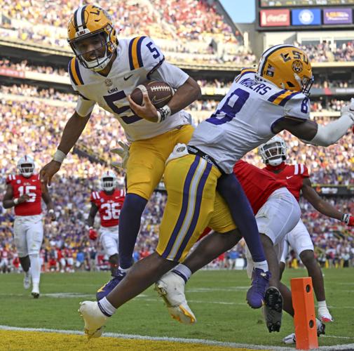 LSU notebook: QB Jayden Daniels uses his legs to take down Ole Miss ...