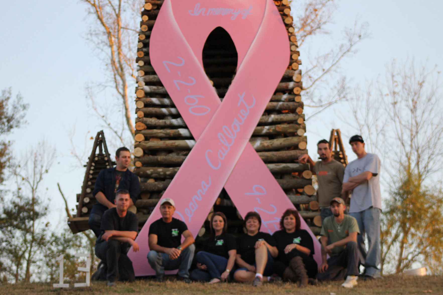 Pink ribbon bonfire among structures going up in flames in the River ...