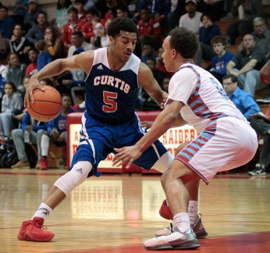 John Curtis boys basketball team on roll, beats Rummel for third ...