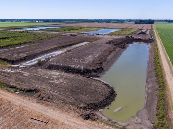 A long-awaited levee is being built. But what about the huge hole in ...