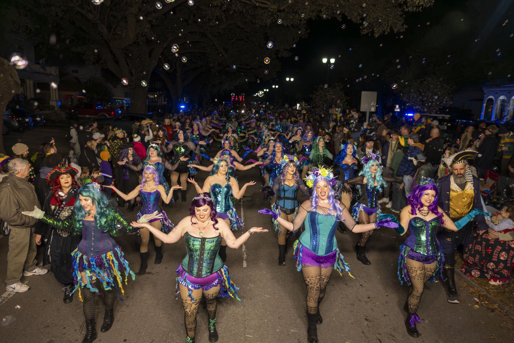 The Krewe of Cleopatra snakes its way through the streets of New ...