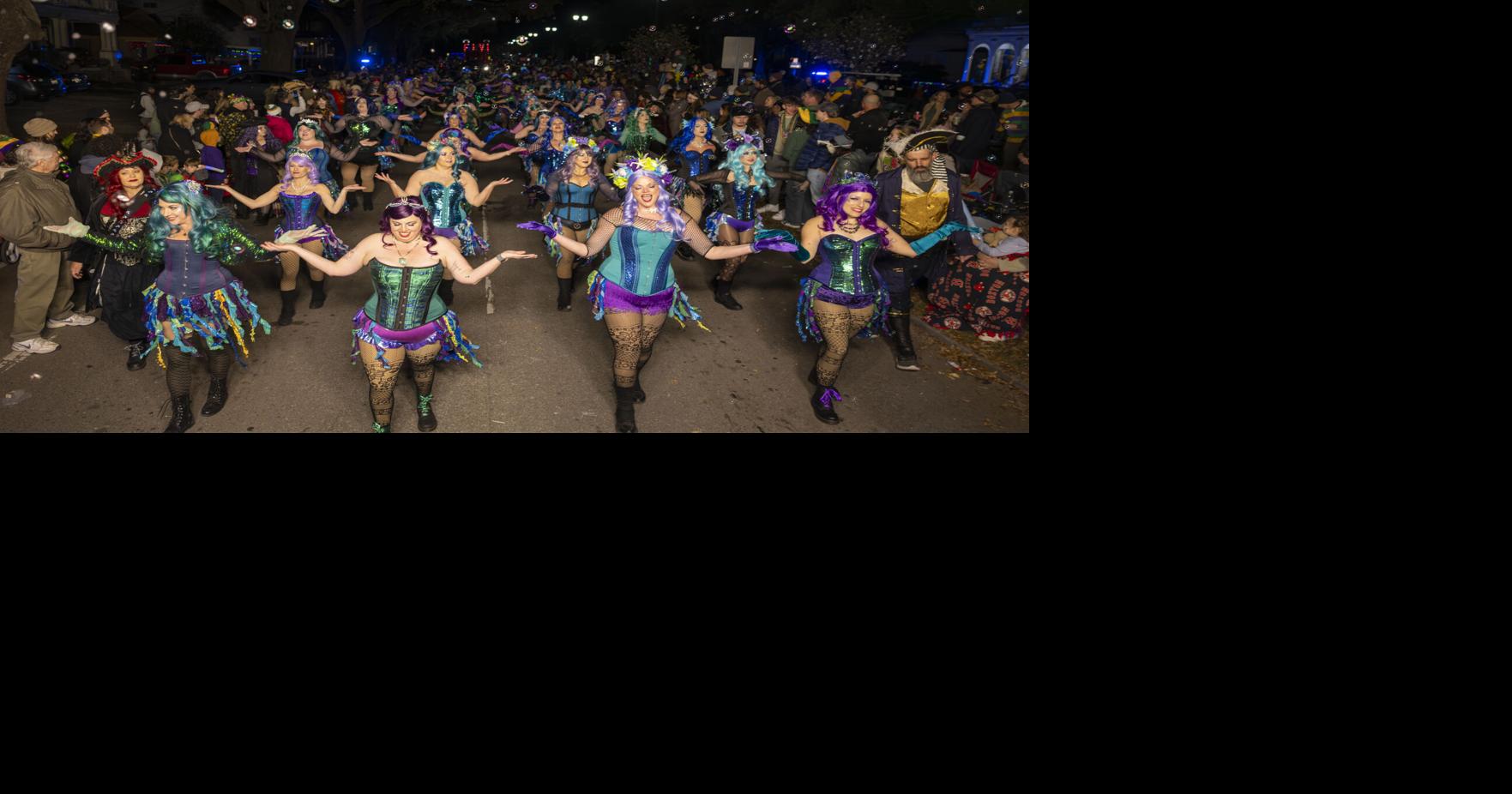 The Krewe of Cleopatra snakes its way through the streets of New ...