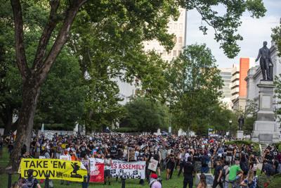 A Saturday night protest continued the call to remove several New ...