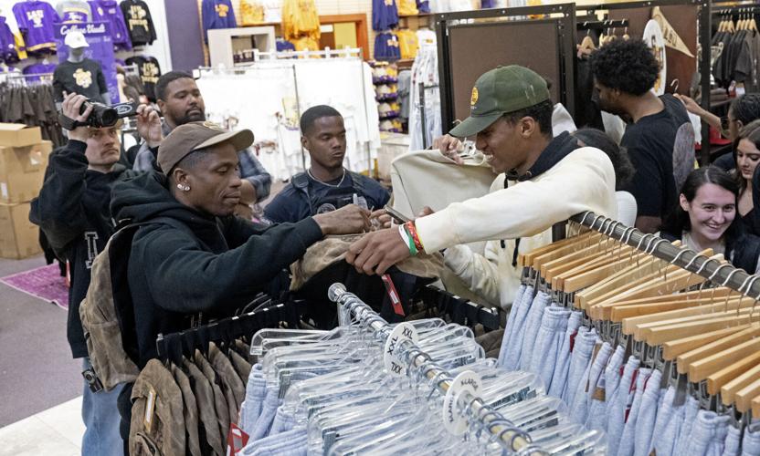 Travis Scott visits LSU for college merchandise collection ...