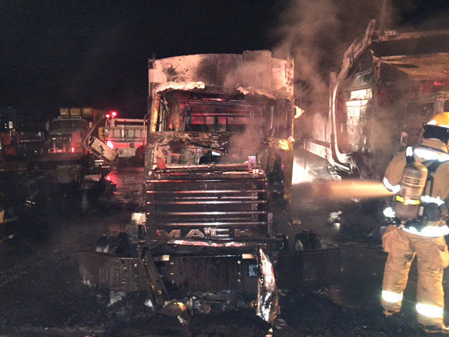 'Smoldering remains' of burned garbage trucks greet firefighters in ...