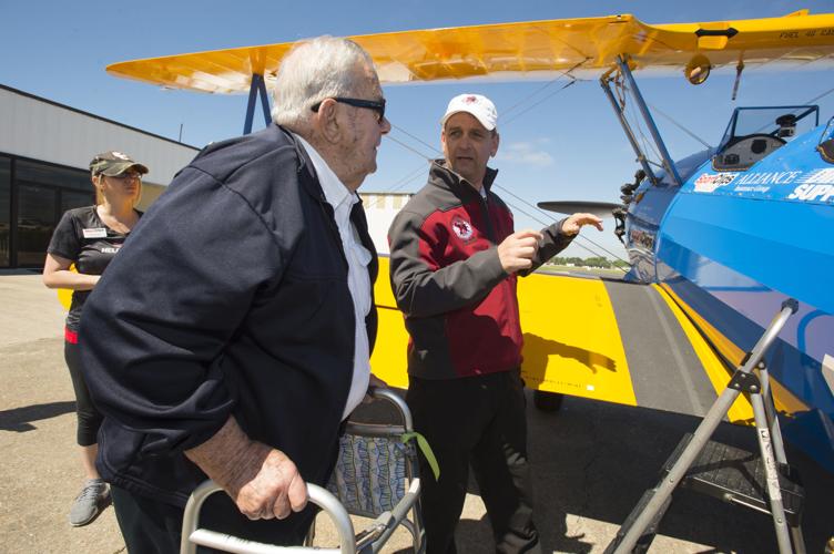 Photos: Retired Vets fly over BR, in Ageless Aviation's open-cockpit ...