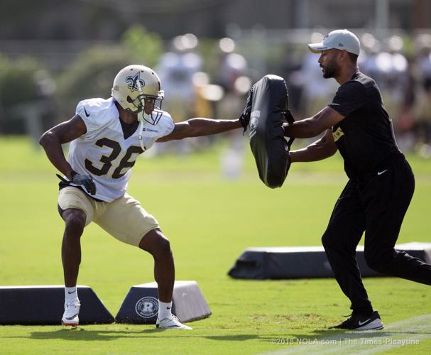 Two Saints players race motorized tackling dummy at practice | Saints ...