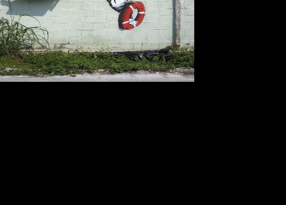 Long-lost Banksy mural rediscovered, restored in New Orleans | Arts ...