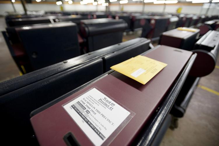 Photos: Election Day Eve, Polling Machines Leave Warehouse for Orleans ...