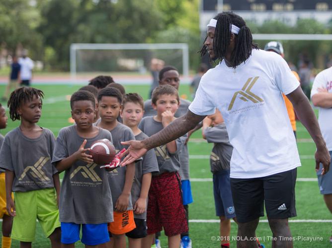Alvin Kamara puts kids to work at first New Orleans football camp ...