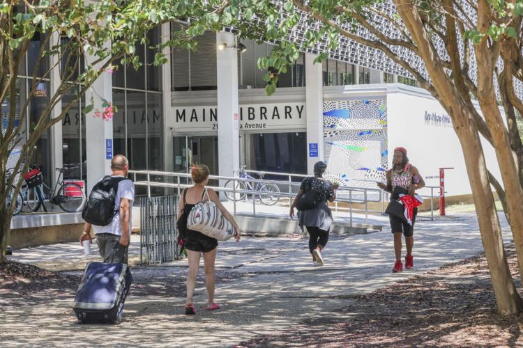 Library staff share more concerns about security guards | Crime/Police ...