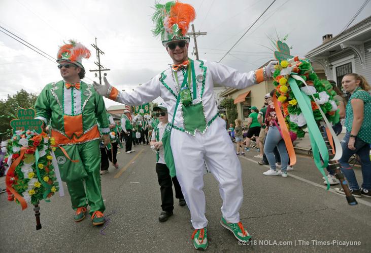 Irish Channel parade flows slowly down Magazine on St. Patrick's Day ...