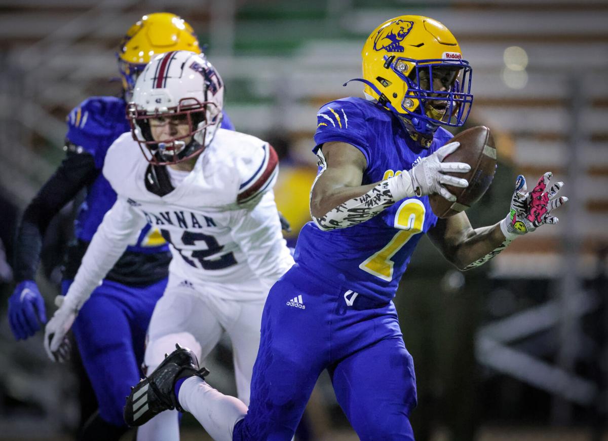 Photos: John F. Kennedy took on Archbishop Hannan in football at Pan ...