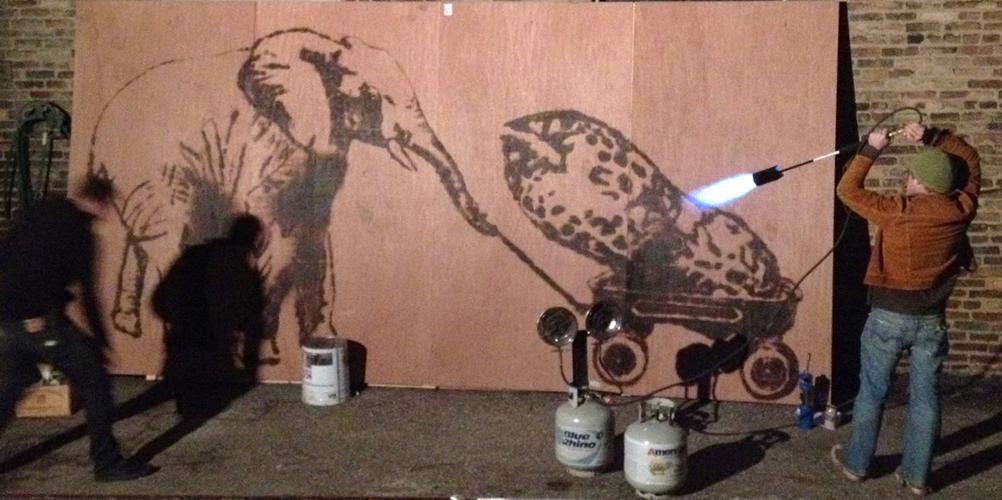 Artist Walker Babington paints giant female nude with fire on Sunday ...
