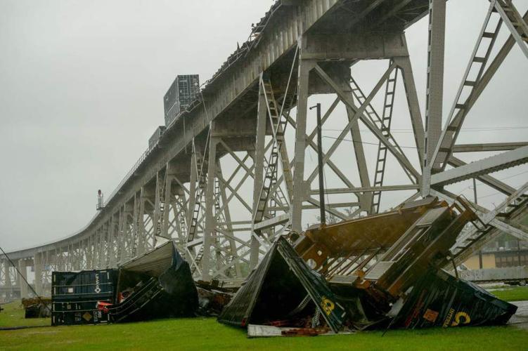 Photos: Trees down, streets flooded and train cars toppled as severe ...