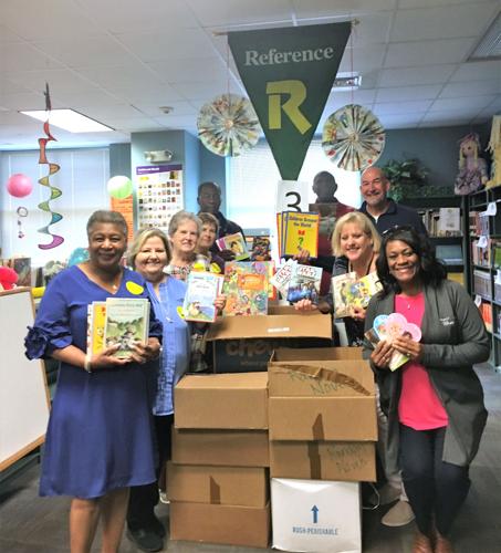 St. Rose Elementary School gets donation of books through RSVP grant ...