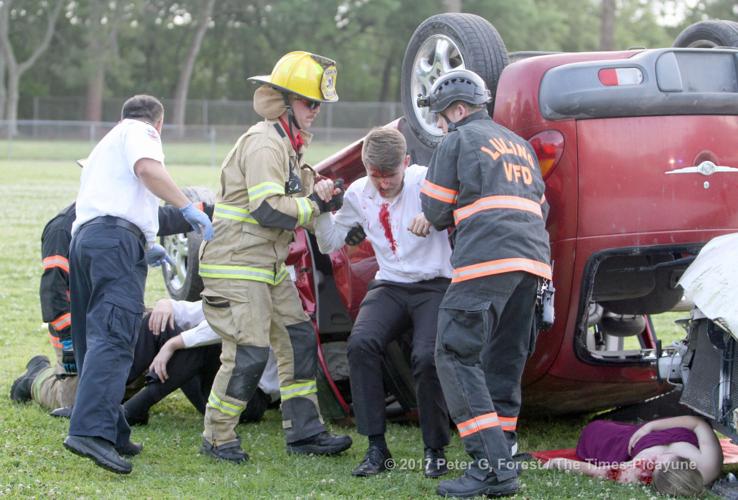 Mock accident brings awareness to drunk driving during prom season in ...