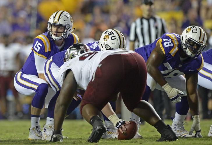 Photos: Troy holds on for massive upset of LSU at Tiger Stadium ...