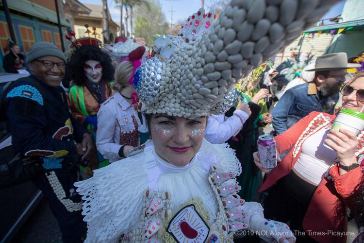 See the krewes of Red Beans and Dead Beans meet on Lundi Gras 2019 ...