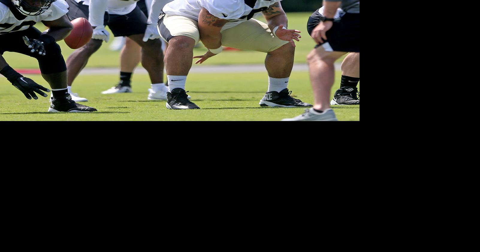 Battle for Saints starting center spot between rookie Erik McCoy ...