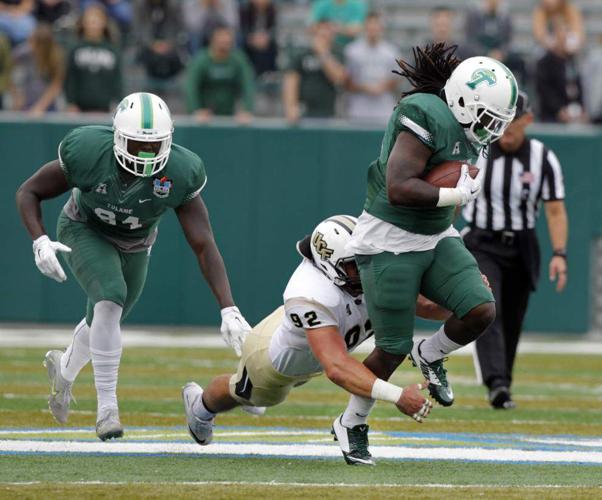 Photos: Tanner Lee triumphs with four touchdown passes, Tulane gets an ...