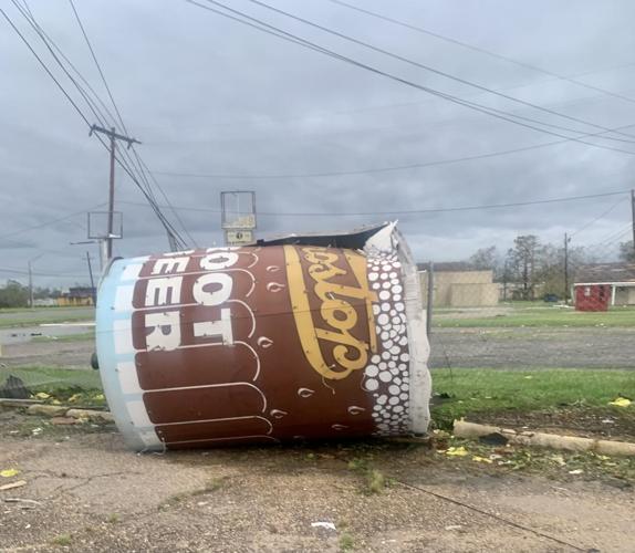With neon and nostalgia, a giant root beer mug returns to its perch in ...