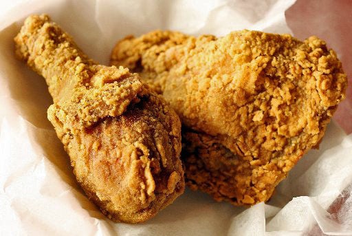 Who's behind that perfect fried chicken at New Orleans Jazz Fest? Meet ...
