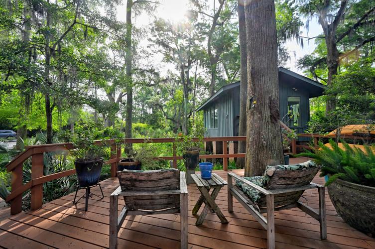 Tucked away on a bayou yet close to Old Mandeville, this home is an ...