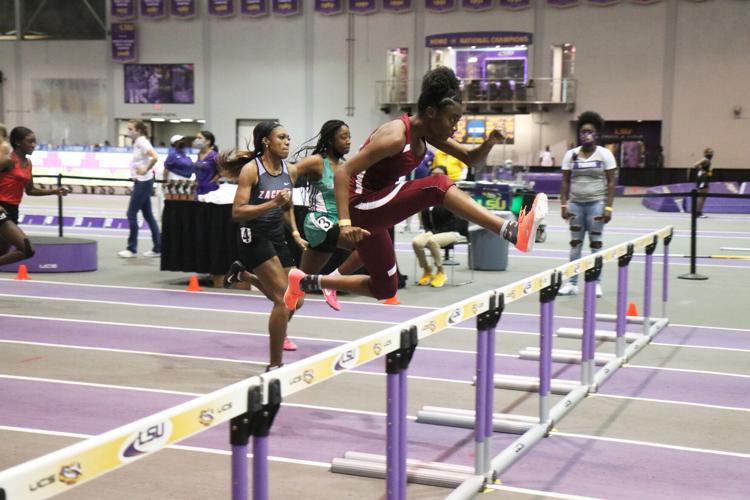 Warren Easton's Leon Elloie, John Curtis' Raven Nunnery claim top track ...