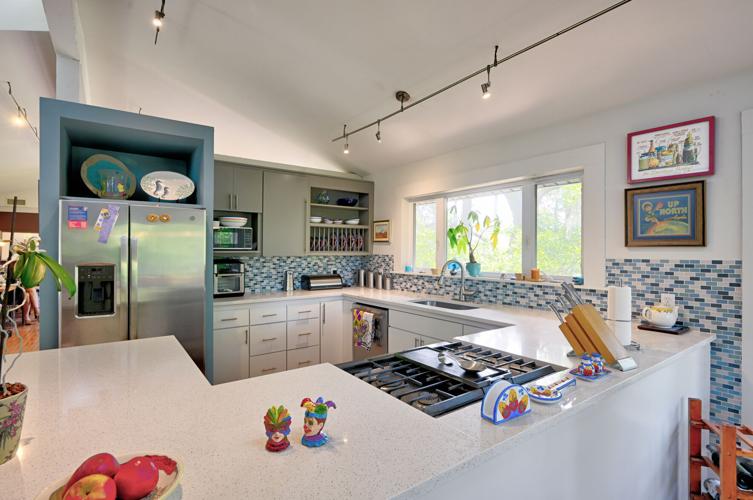 Tucked away on a bayou yet close to Old Mandeville, this home is an ...