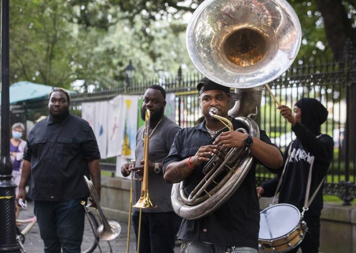 Friends second-line to celebrate well-known French Quarter photographer ...