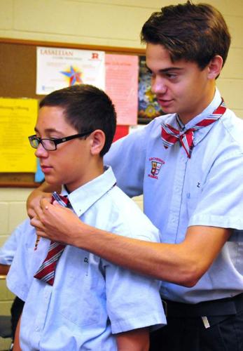 Knot a typical homeroom at Archbishop Rummel High School in Metairie ...
