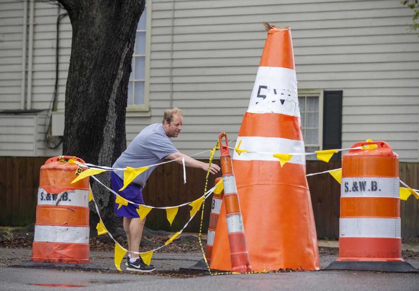 Photos: Giant New Orleans potholes meet their nemesis, the giant orange ...