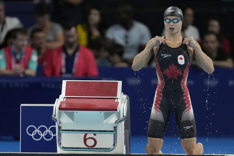 Former LSU swimmer Mac Neil advances in Olympic 100 fly | Olympics ...