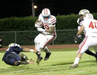 Rummel 21, Covington 0: Shahid Reece, Derrick Munson dominate Lions ...