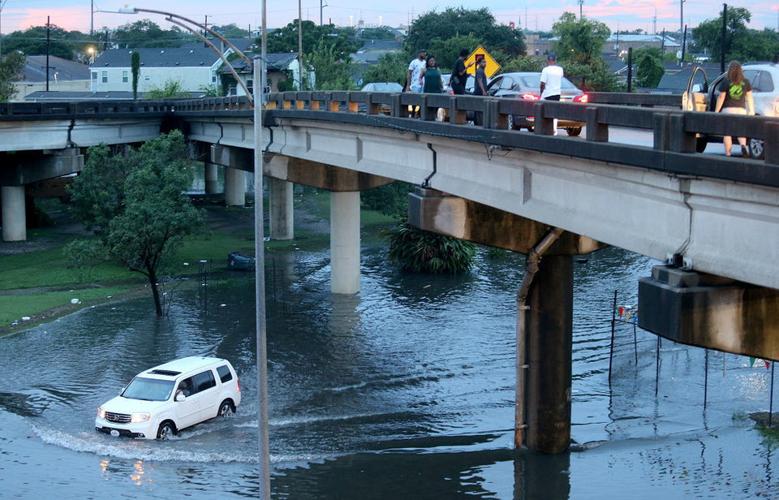 How other flood-prone cities warn residents of dangerous road ...