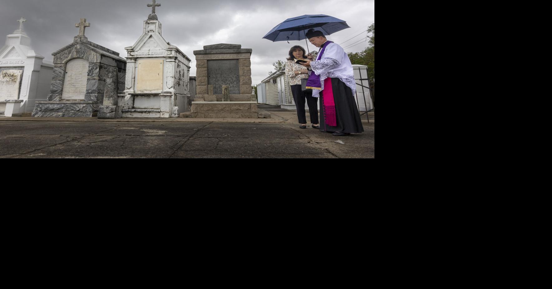 Photos: New Orleans cemeteries are blessed with Holy Water on a rainy ...