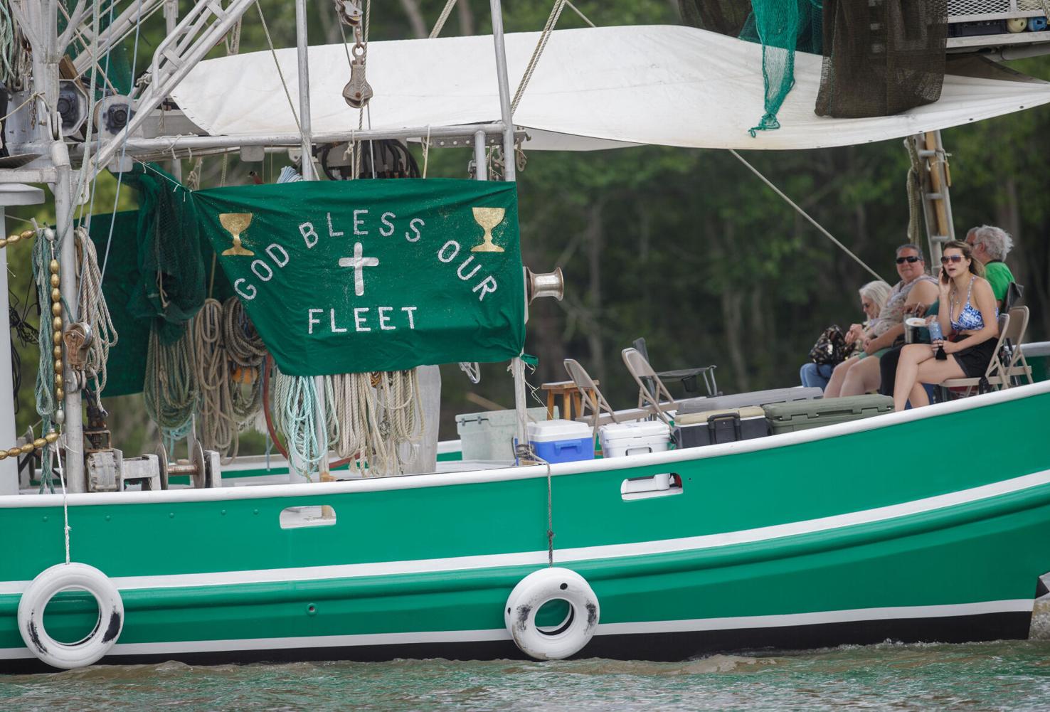 Photos: White shrimp boots, an archbishop, a barge, Holy Water and a ...