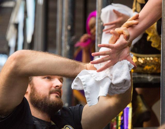 Photos: Annual 'Greasing of the Poles' event kicks off Mardi Gras ...
