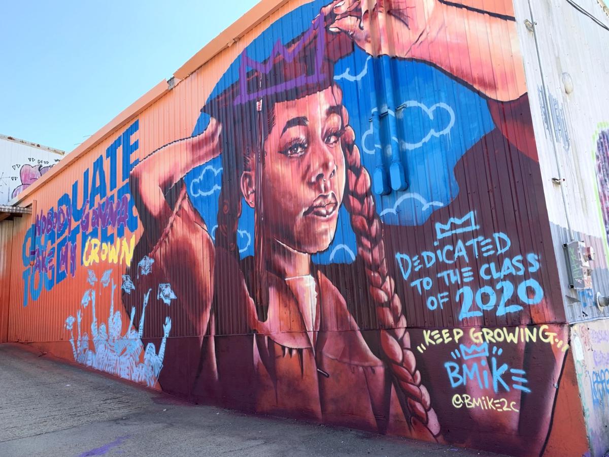 Artist BMike Odums provides photo op graffiti-style mural for ...