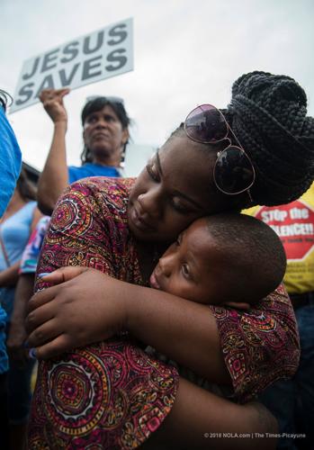 'This demon called gun violence': A vigil for 3 dead, 7 wounded | Crime ...