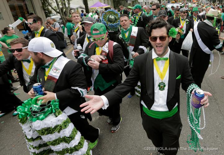 Irish Channel parade flows slowly down Magazine on St. Patrick's Day ...
